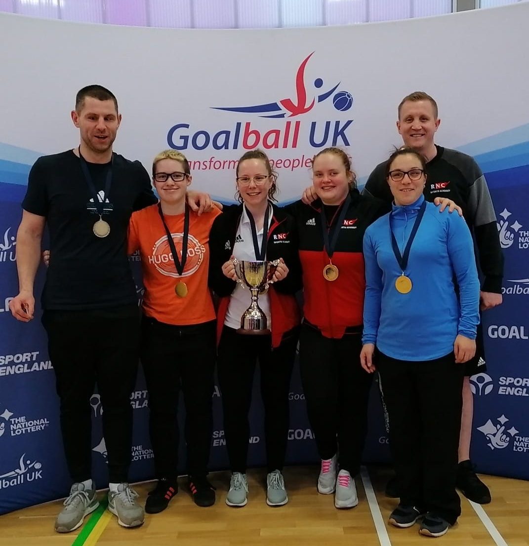 Aaron Ford & RNC Team Photo with trophy! - Goalball UK